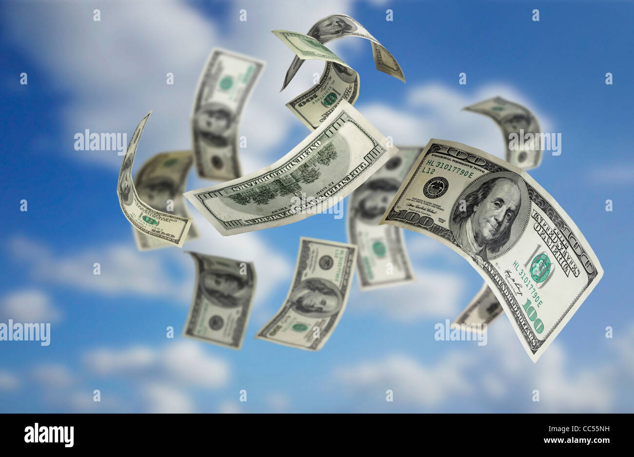 Falling Money $100 Bills Stock Photo - Alamy