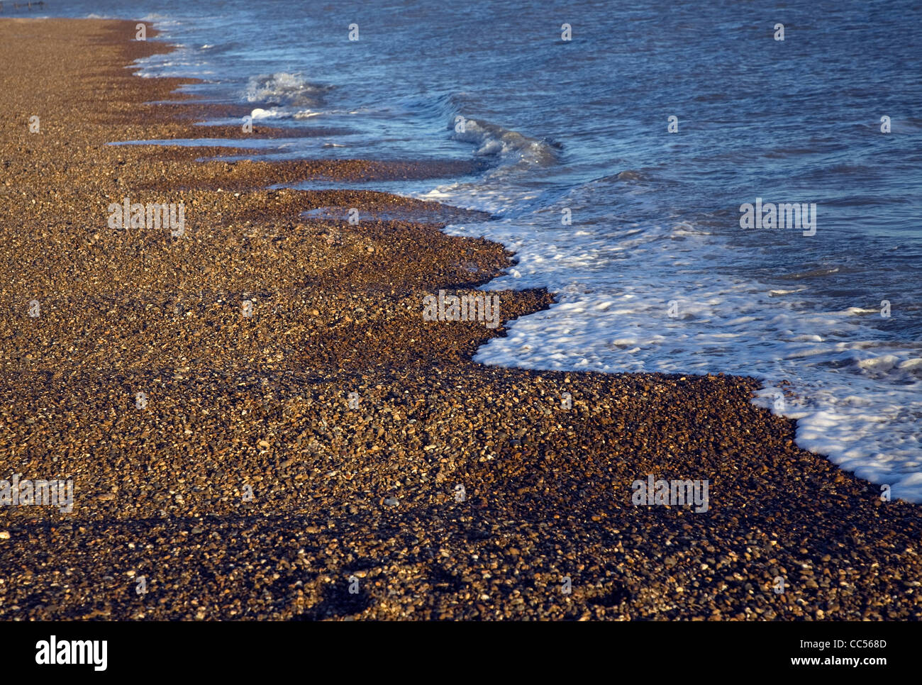 Wave swash forming shingle beach cusps Stock Photo - Alamy