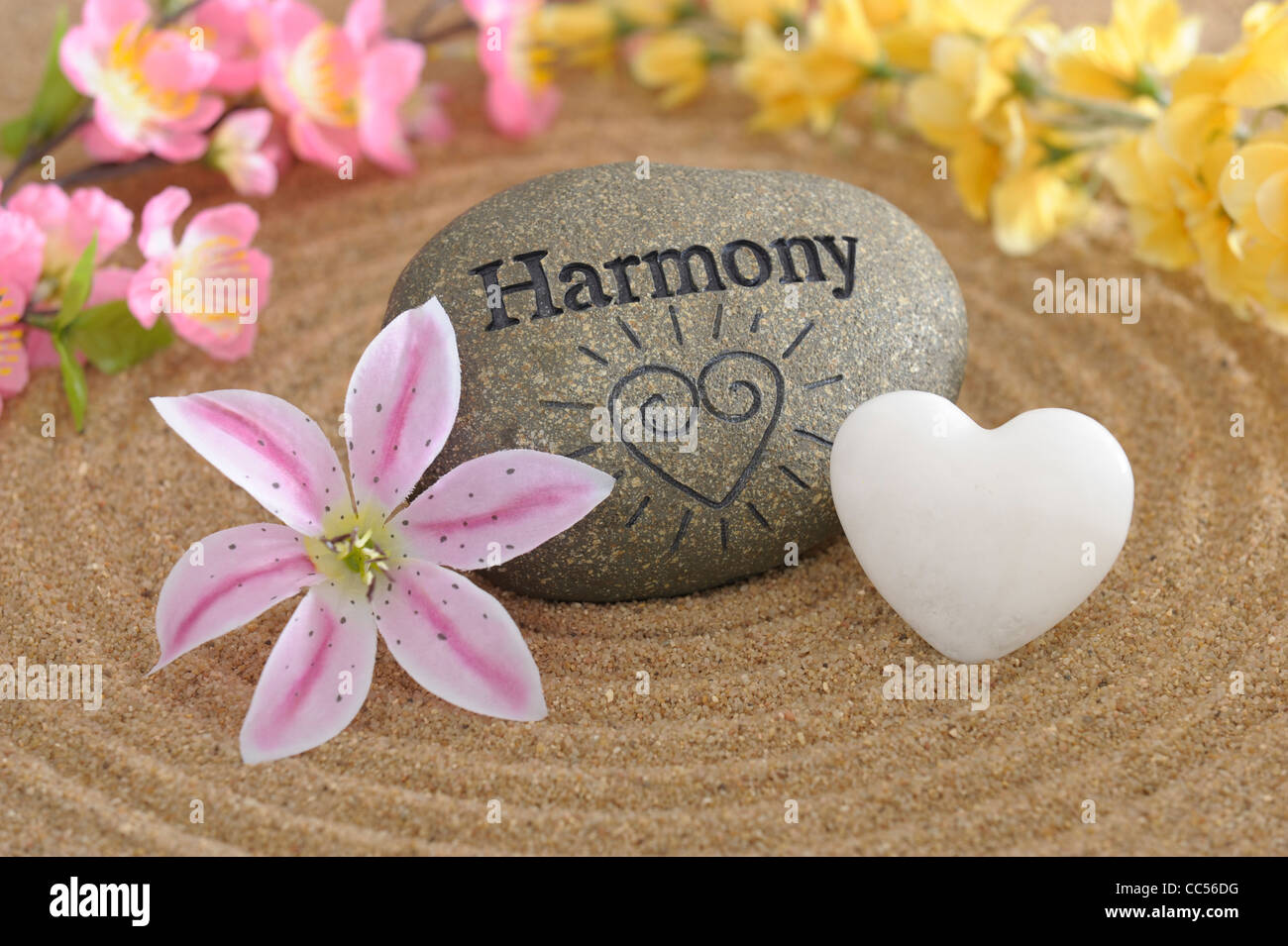 zen stone of harmony in sand Stock Photo - Alamy