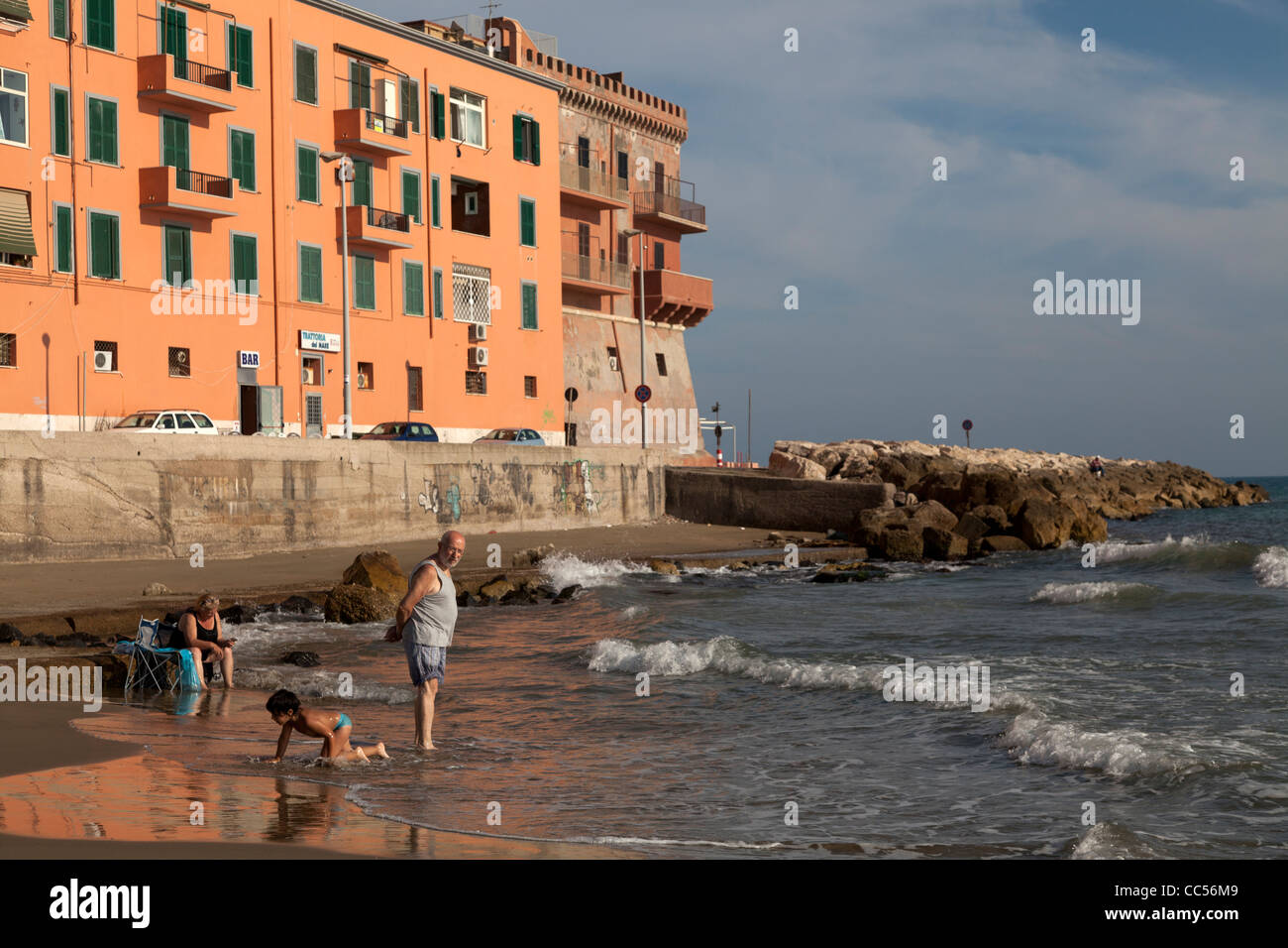grandparents and grandson paddling off Anzio beach Stock Photo - Alamy
