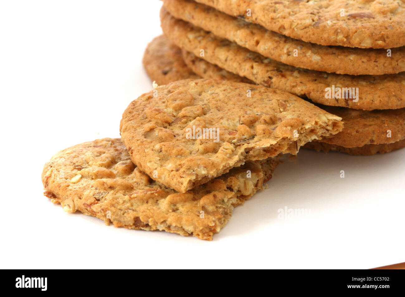 Stack of whole grain biscuits on white background Stock Photo - Alamy