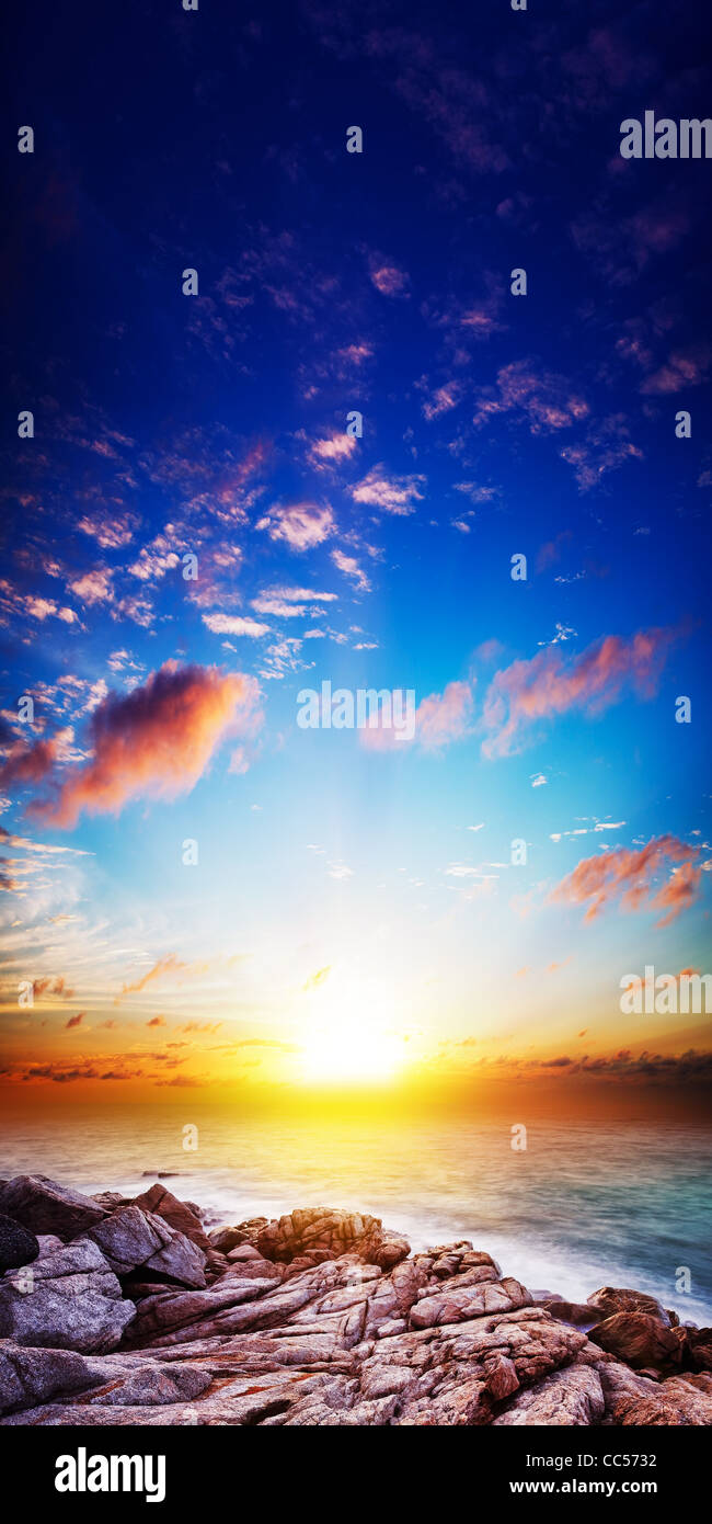 Amazing sunset scene. Long exposure shot, vertical panoramic ...