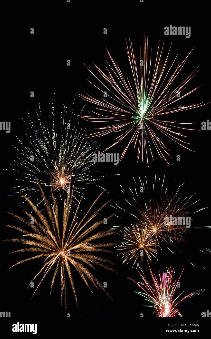 Multiple fireworks explosions display Stock Photo - Alamy