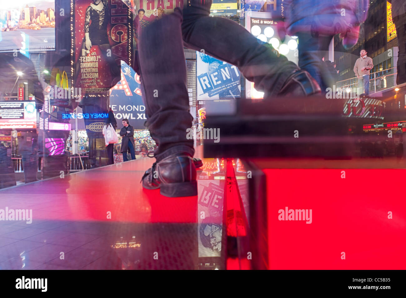Times Square TKTS big Red Stairway, CLOSEUP from side, visitors legs ...