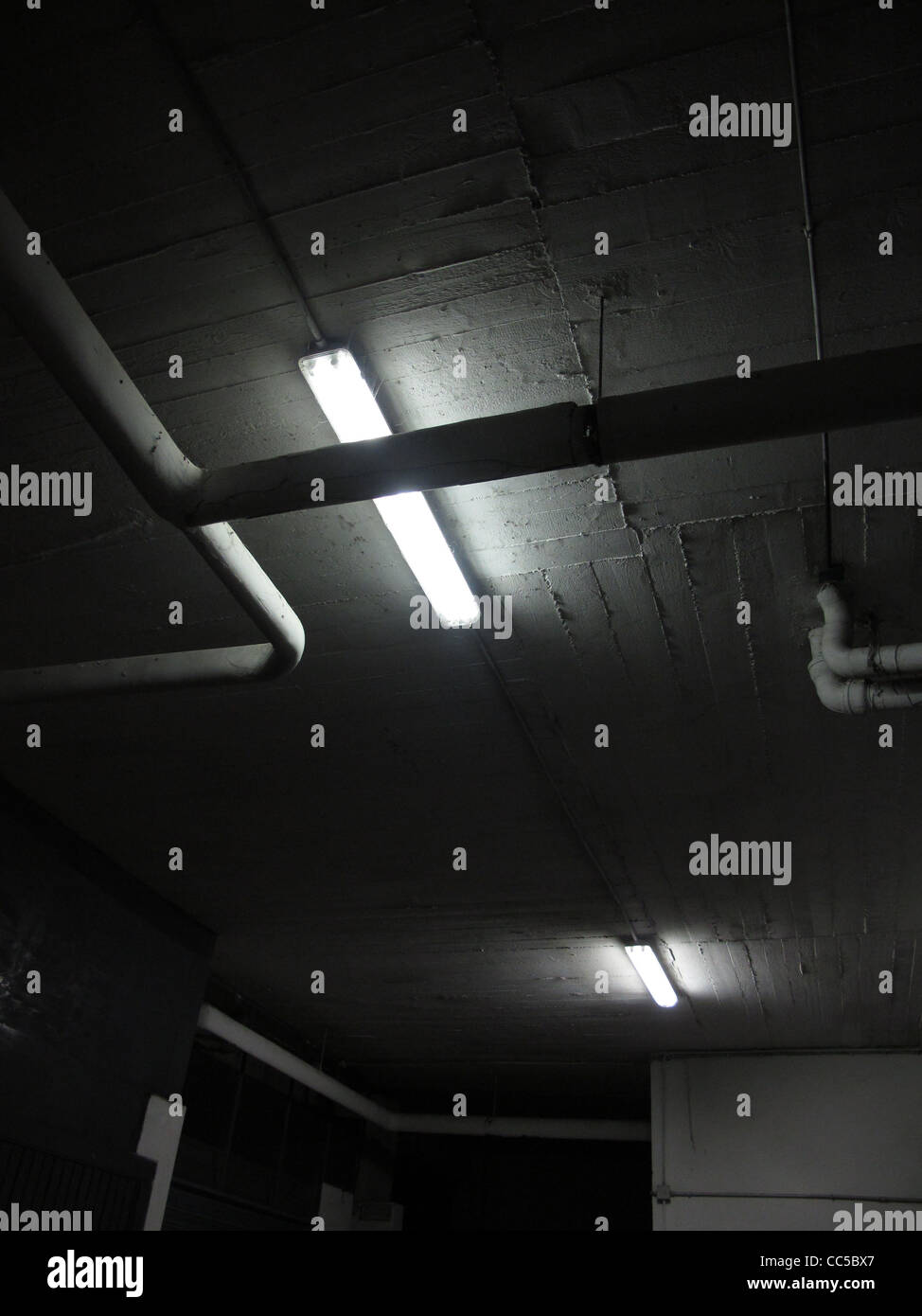 strip light in dark alley passage tunnel at night Stock Photo - Alamy