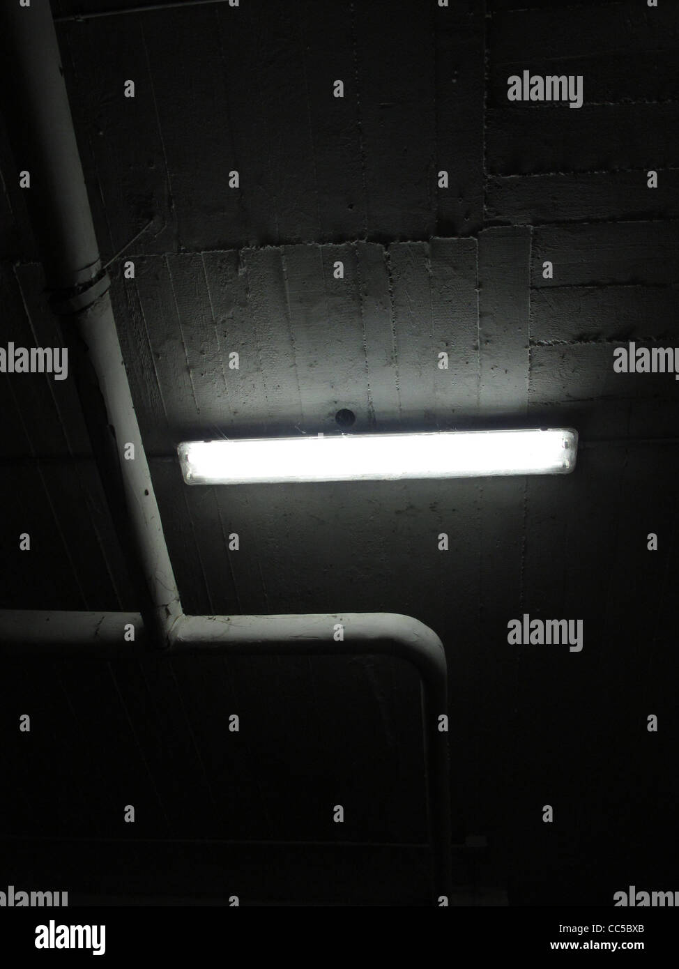 strip light in dark alley passage tunnel at night Stock Photo - Alamy