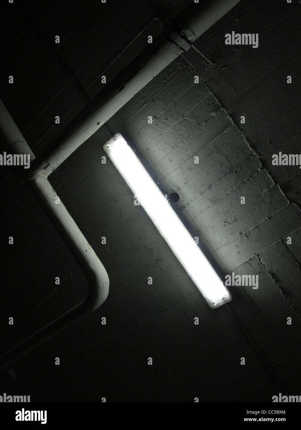 strip light in dark alley passage tunnel at night Stock Photo - Alamy