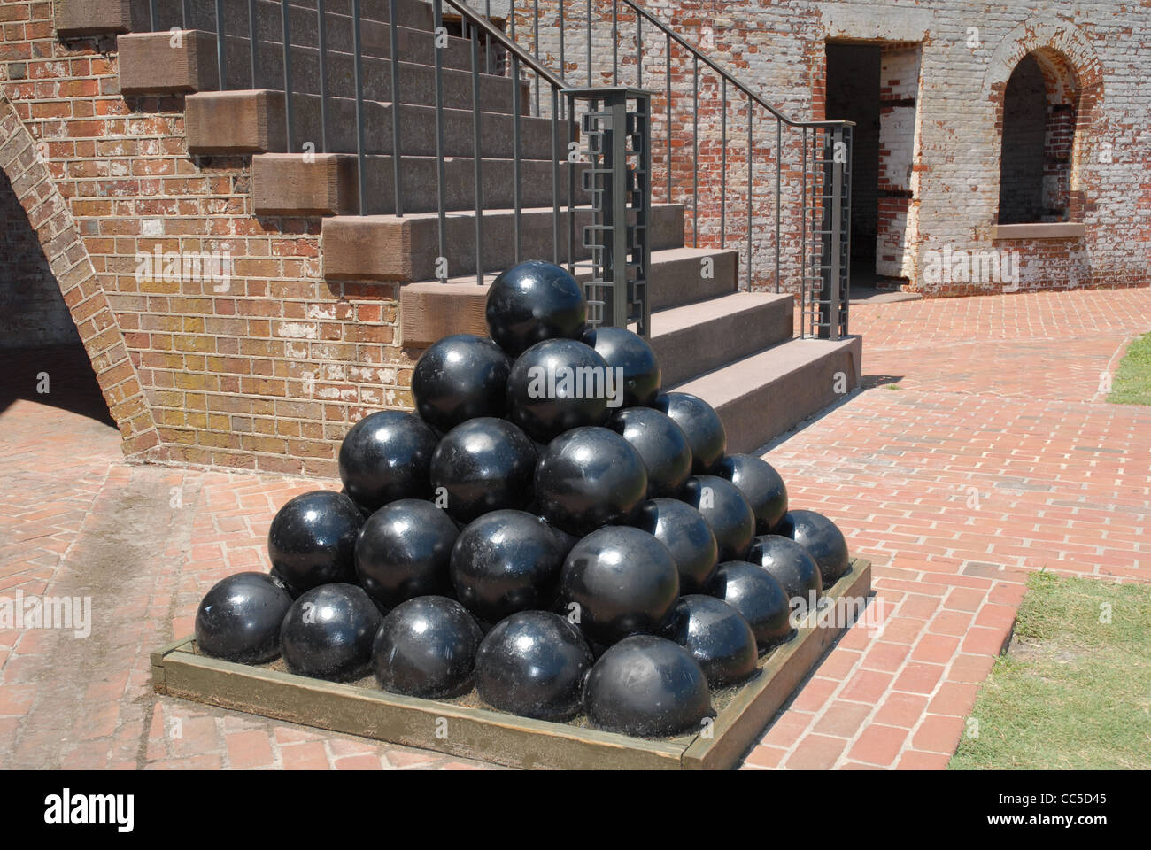 A stack of Cannon Balls at Fort Macon State Park Stock Photo - Alamy