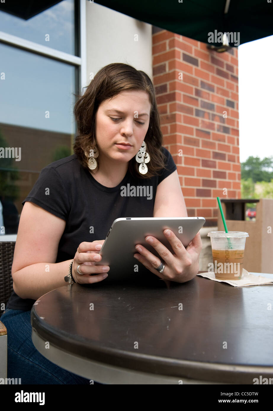 Read ipad hi-res stock photography and images - Alamy