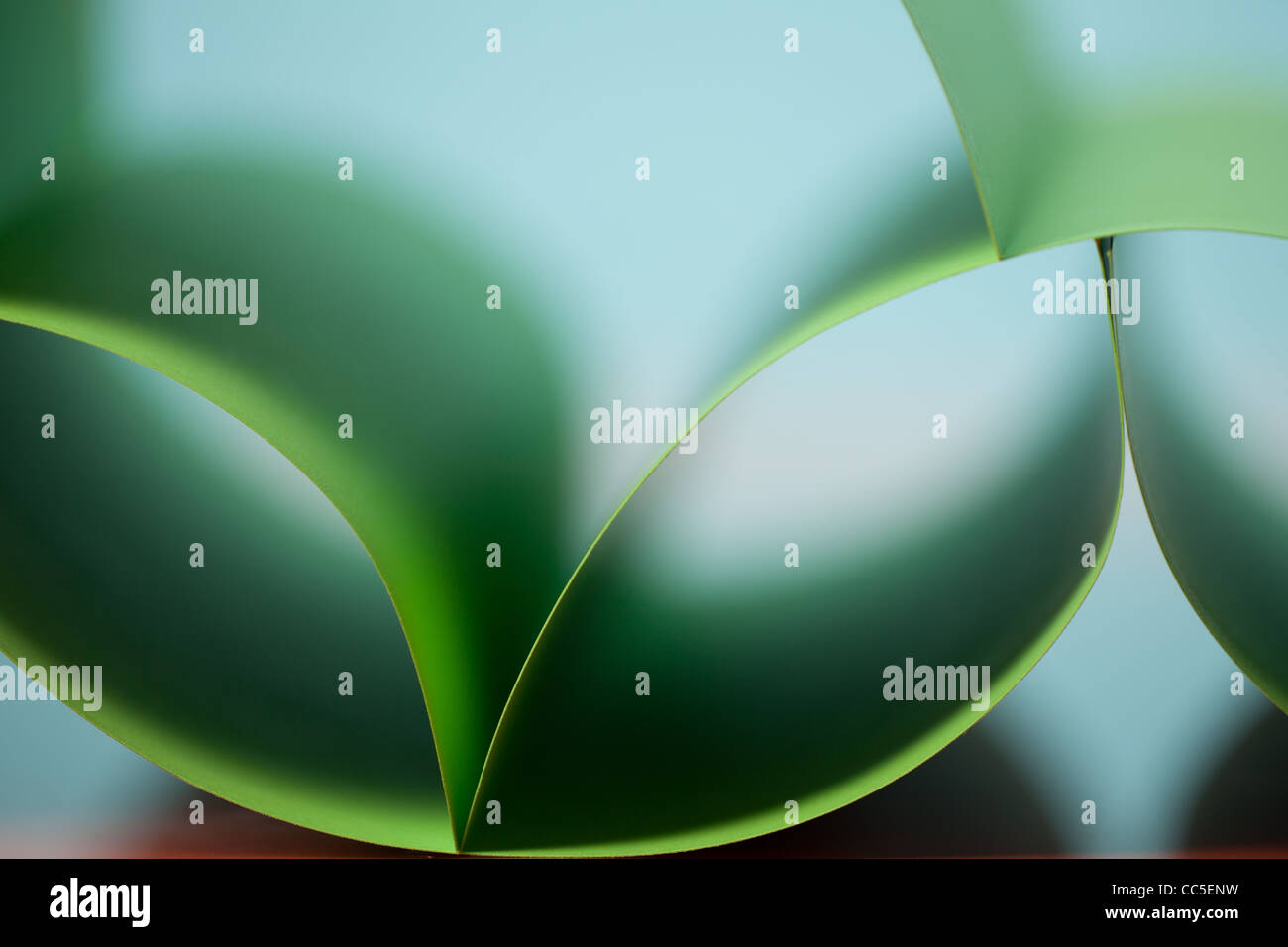 graphic abstract image of colorful origami pattern made of curved ...