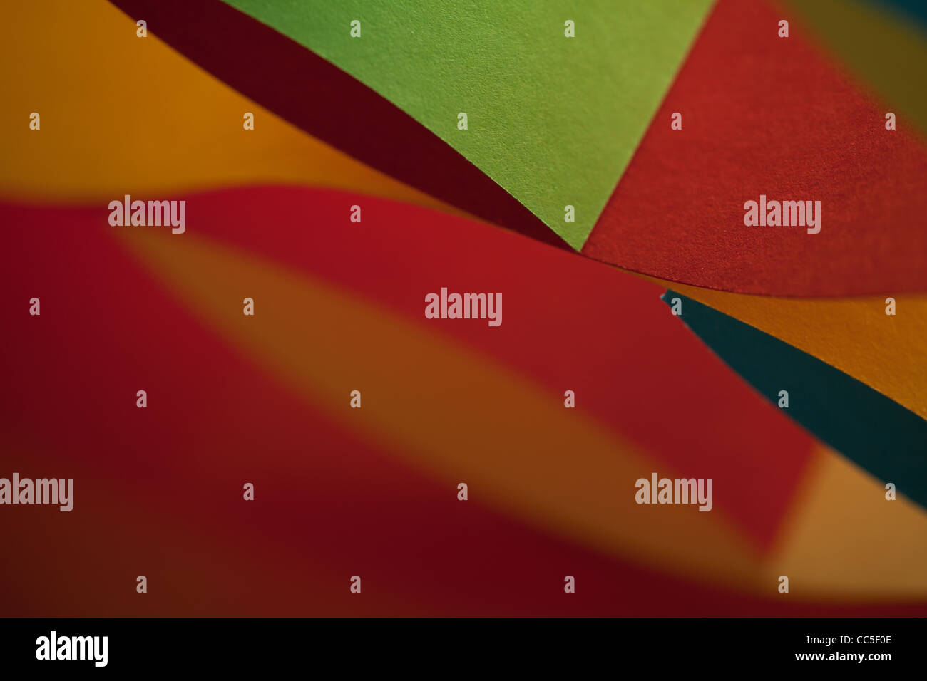 graphic abstract image of colorful origami pattern made of curved ...