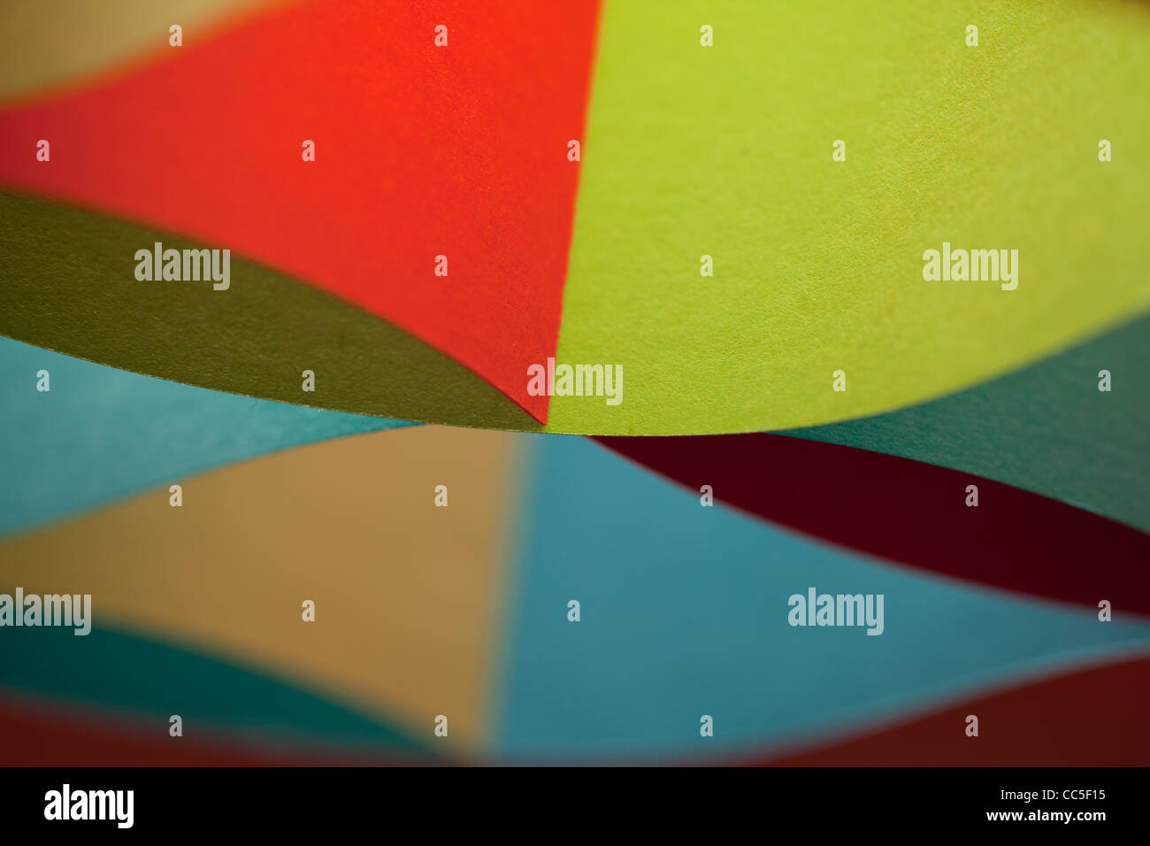 graphic abstract image of colorful origami pattern made of curved ...