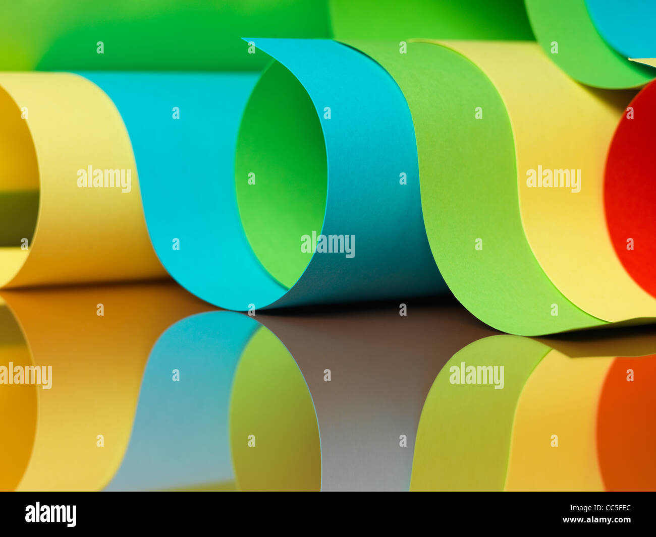 background macro image of colored origami pattern made of curved sheets ...