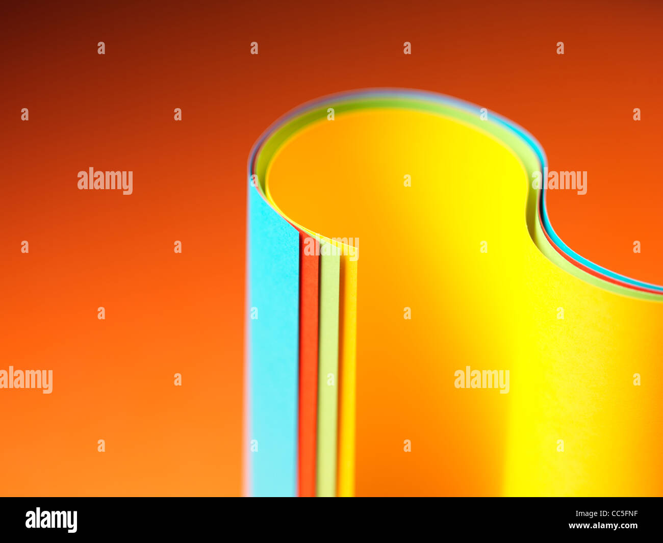 graphic macro image of colorful origami pattern made of curved sheets ...