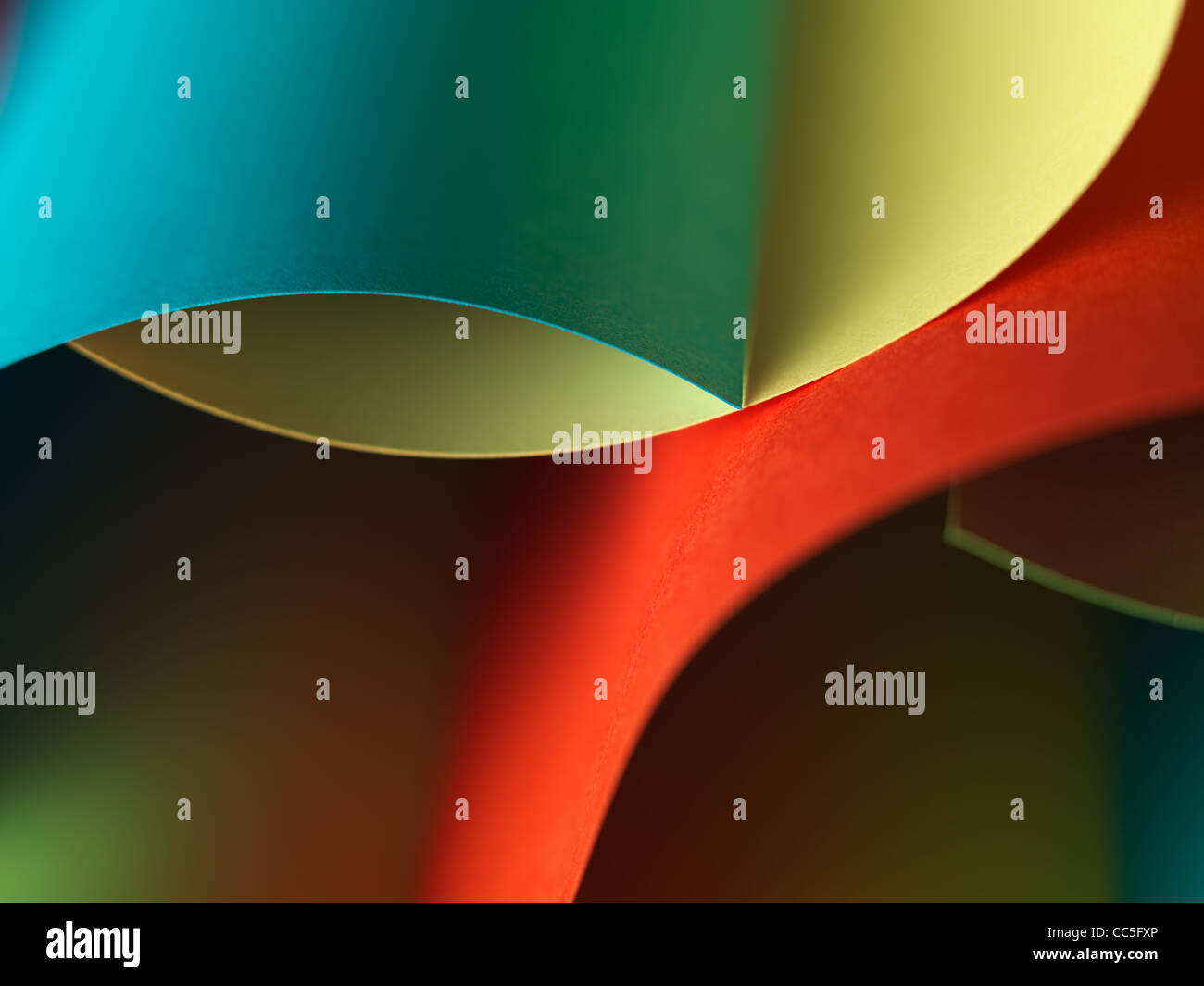 graphic macro image of colorful origami pattern made of curved sheets ...