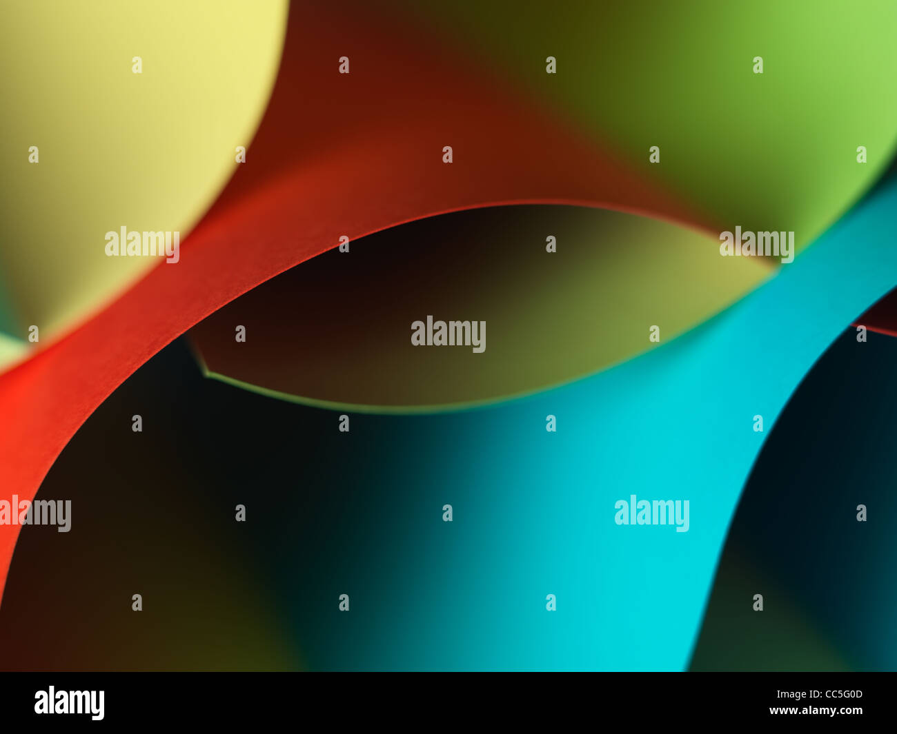 graphic macro image of colorful origami pattern made of curved sheets ...