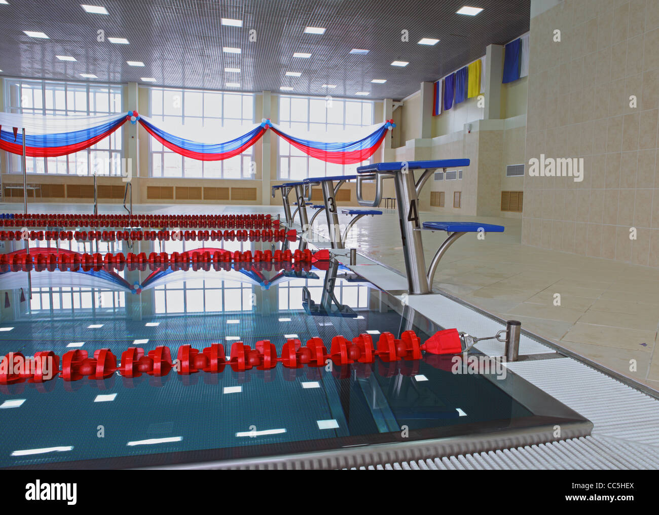 Swimming pool with diving board and swimming lane marker Stock Photo ...