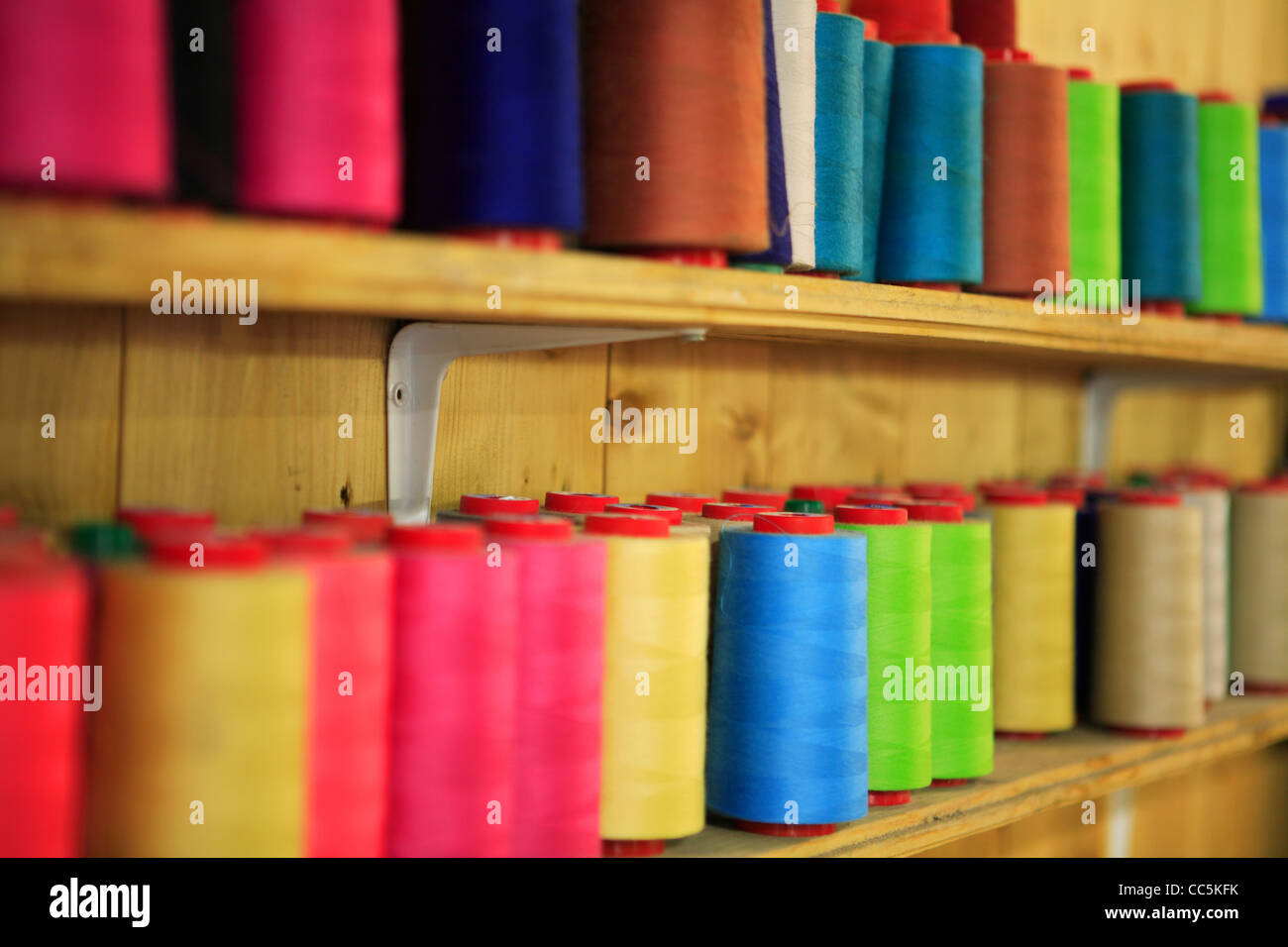 Colourful spools of wool Stock Photo - Alamy