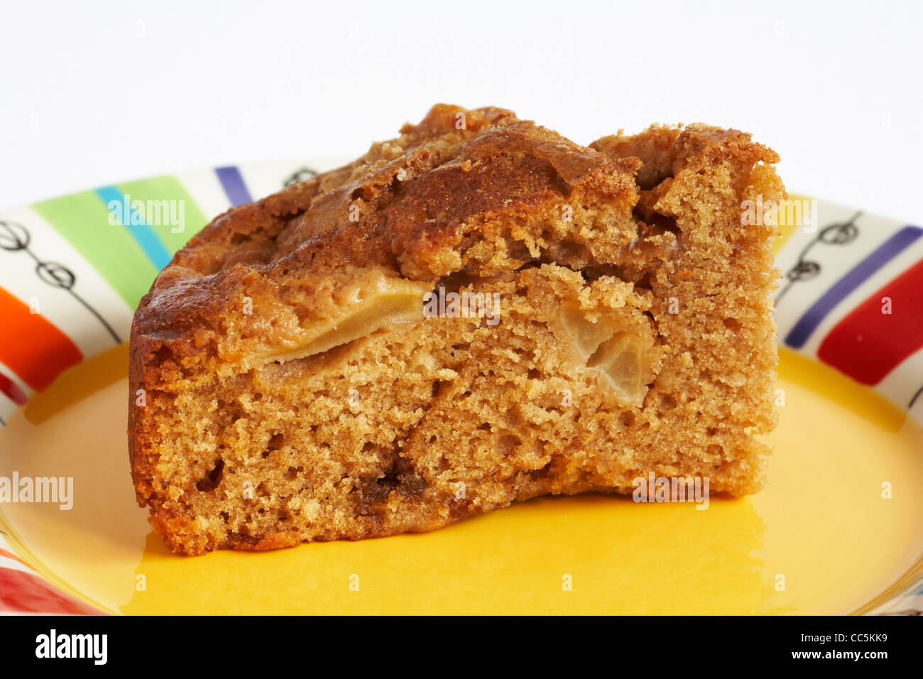 Herman German friendship cake on yellow patterned plate Stock Photo - Alamy