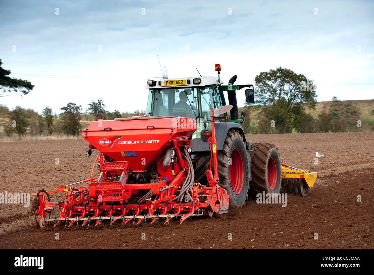 Planting winter barley with Fendt tractor and Kuhn seed drill Stock ...