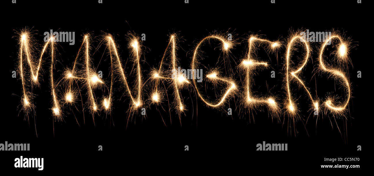 Word managers written sparkler Stock Photo - Alamy
