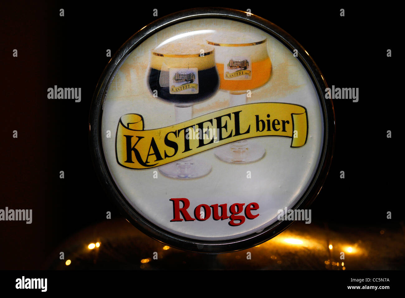A beer tap displays the Belgium Kasteel Rouge draught beer logo Stock ...