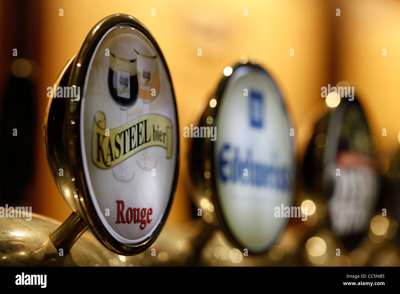 A beer tap displays the Belgium Kasteel Rouge draught beer logo Stock ...