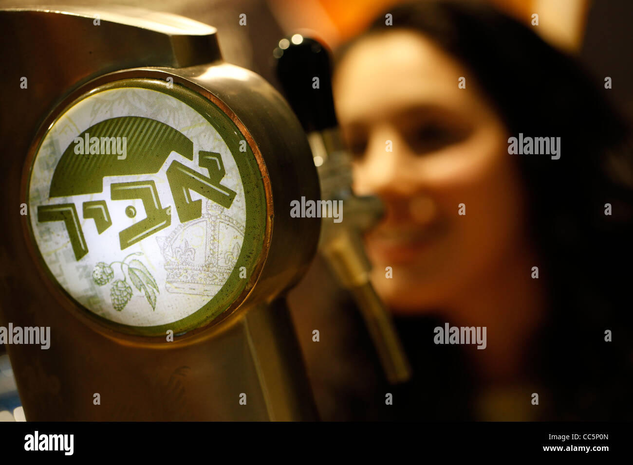 A beer tap displays the Israeli Abir microbrewery beer logo Stock Photo ...