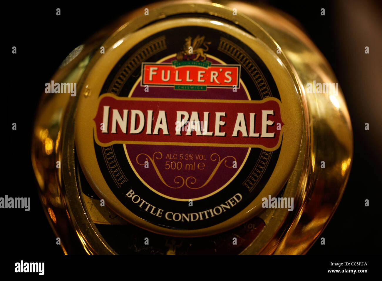 A beer tap displays the English India Pale Ale beer logo Stock Photo ...