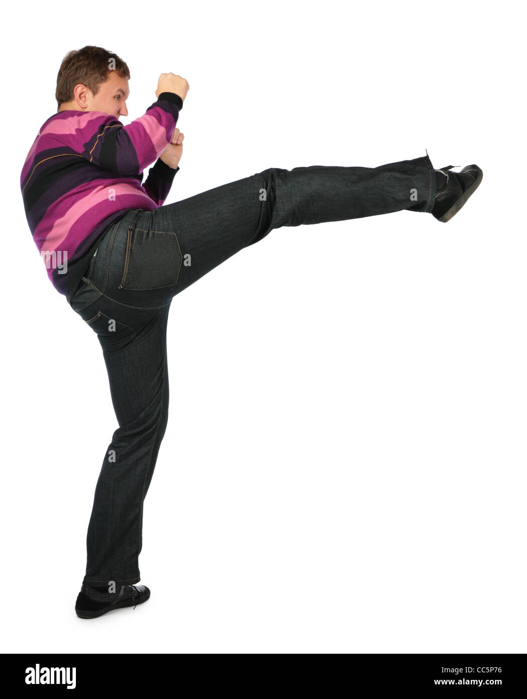 Man kicks a foot from scope Stock Photo - Alamy