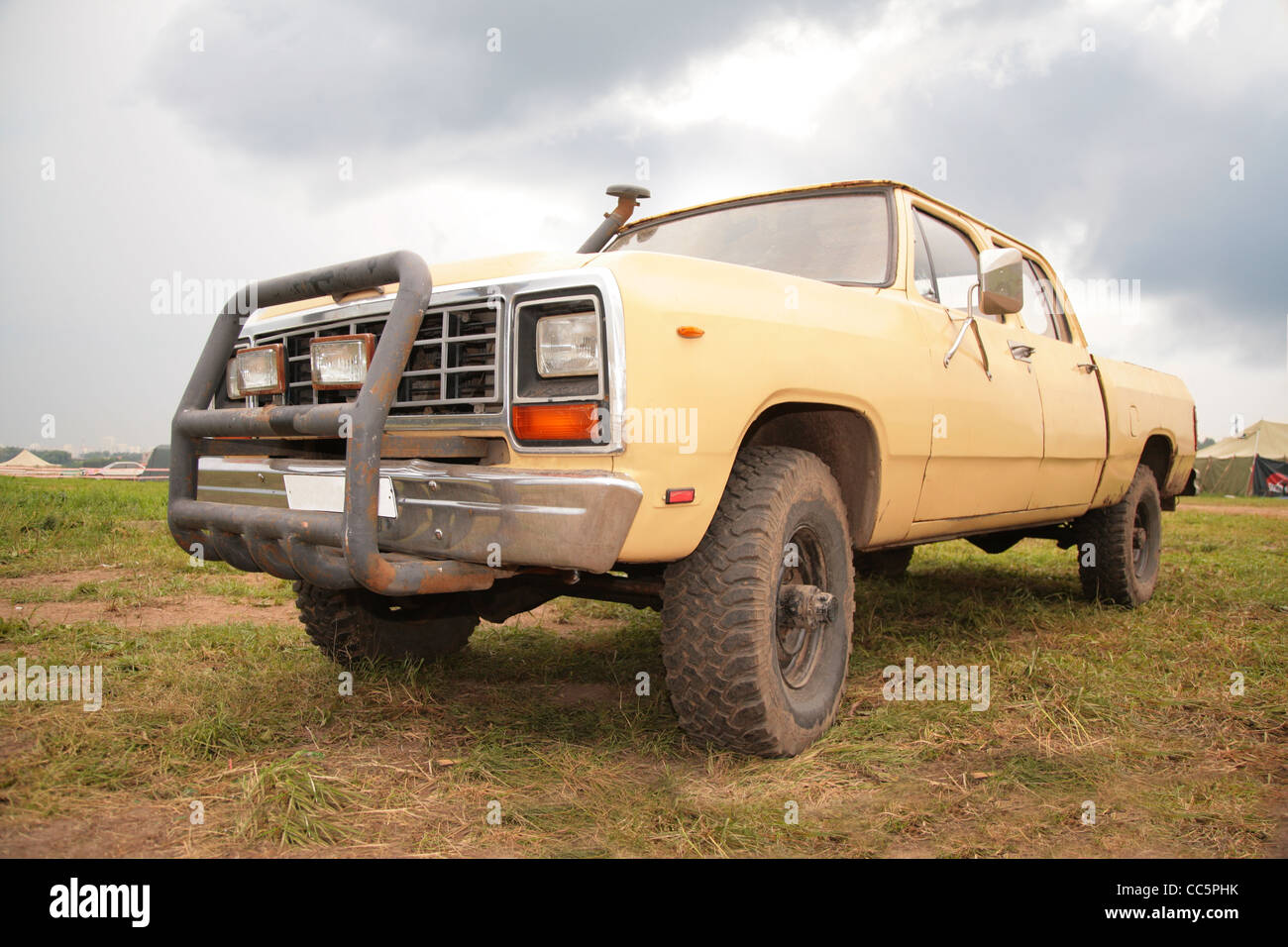 Old yellow pick-up Stock Photo - Alamy