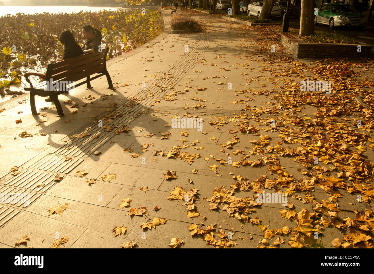 Chinese women resting beside West Lake, Hangzhou, Zhejiang , China ...
