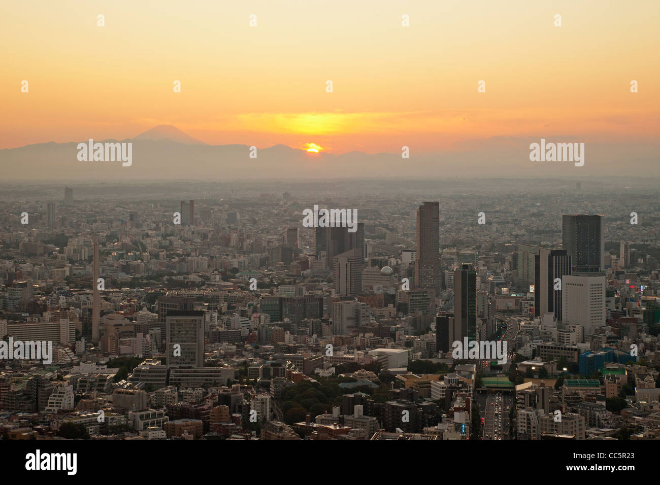 Japan, Tokyo, Roppongi, View of Shibuya Skyline and Mount Fuji at Dusk ...