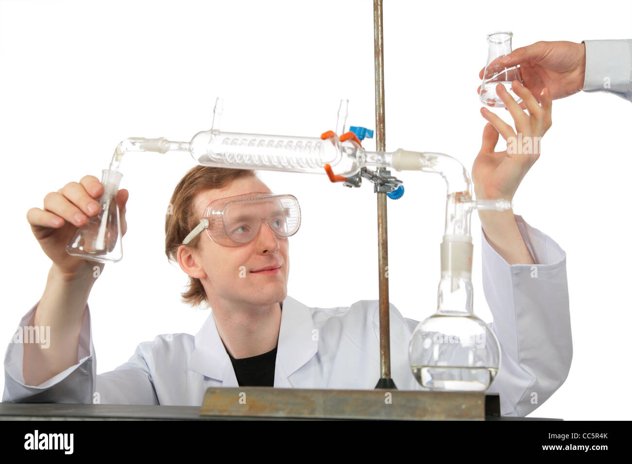Chemist and chemical equipment, giving hand Stock Photo - Alamy
