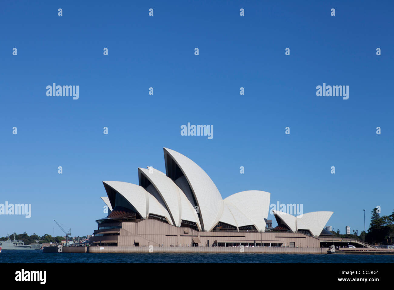 A view of the Sydney Opera House with a bright blue sky Stock Photo - Alamy