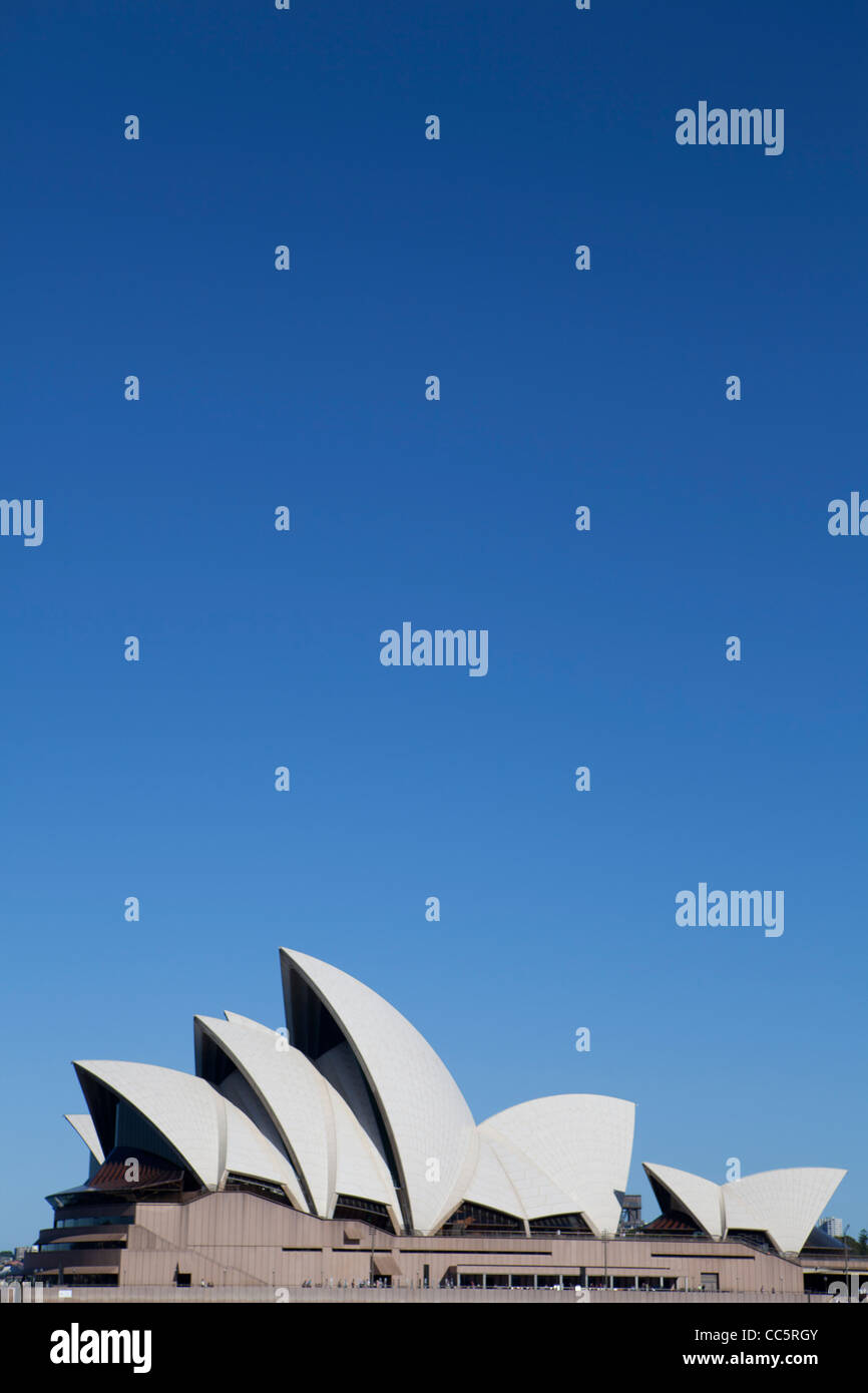 A view of the Sydney Opera House with a bright blue sky Stock Photo - Alamy