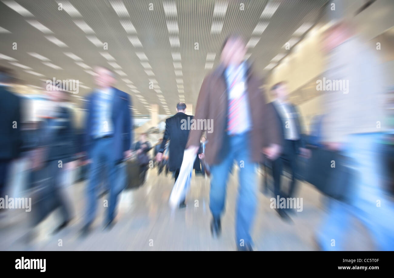 Moving people in business center Stock Photo - Alamy