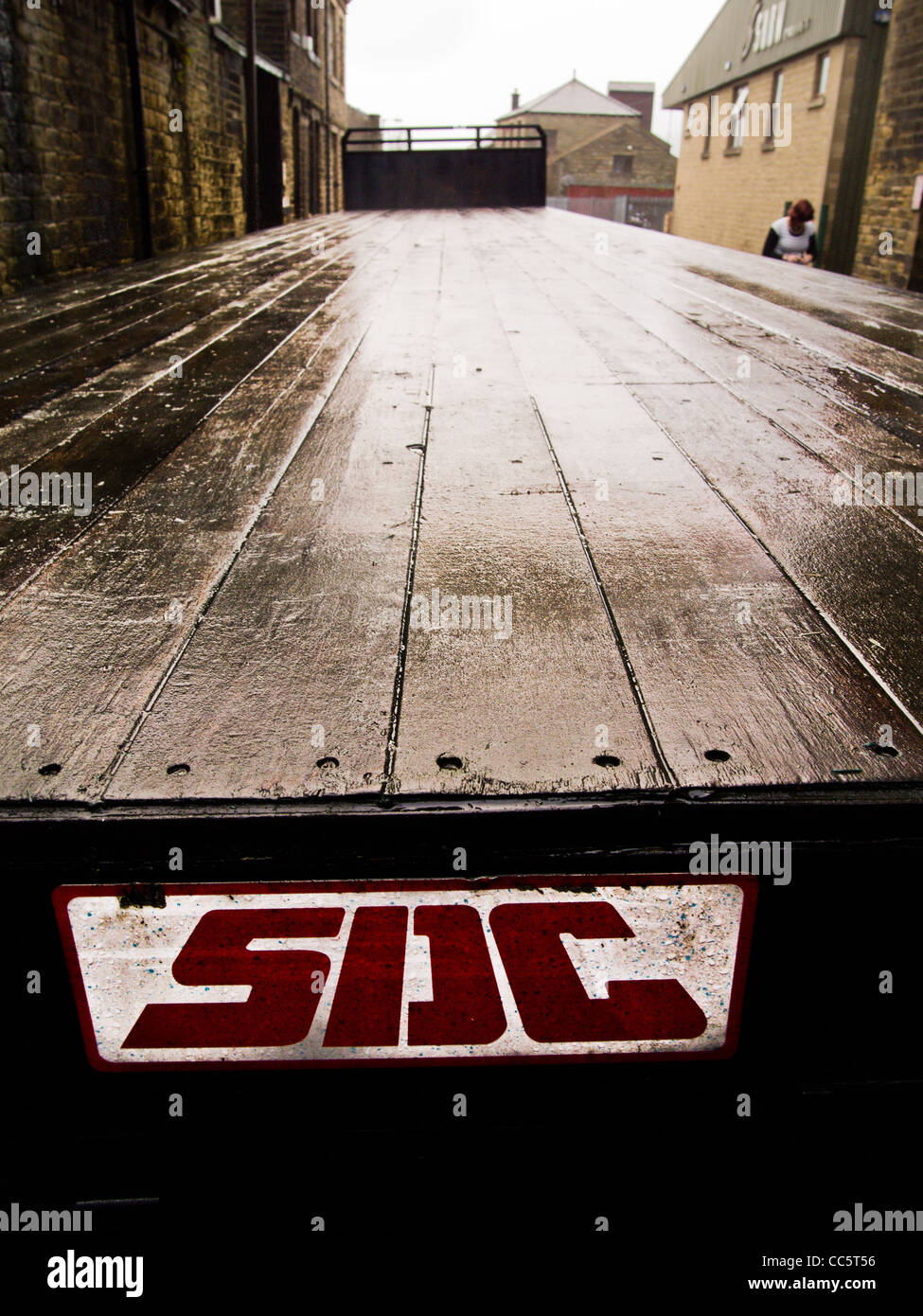 The rear of a lorry trailer along with the makers sign Stock Photo - Alamy