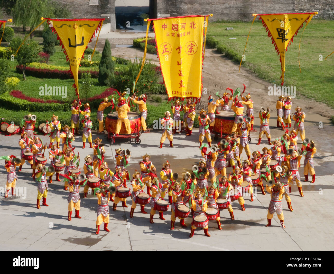 Chinese people performing Changshan Warring Drum Dance in front of ...