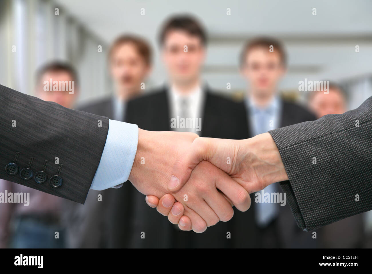 shaking hands and business team Stock Photo - Alamy