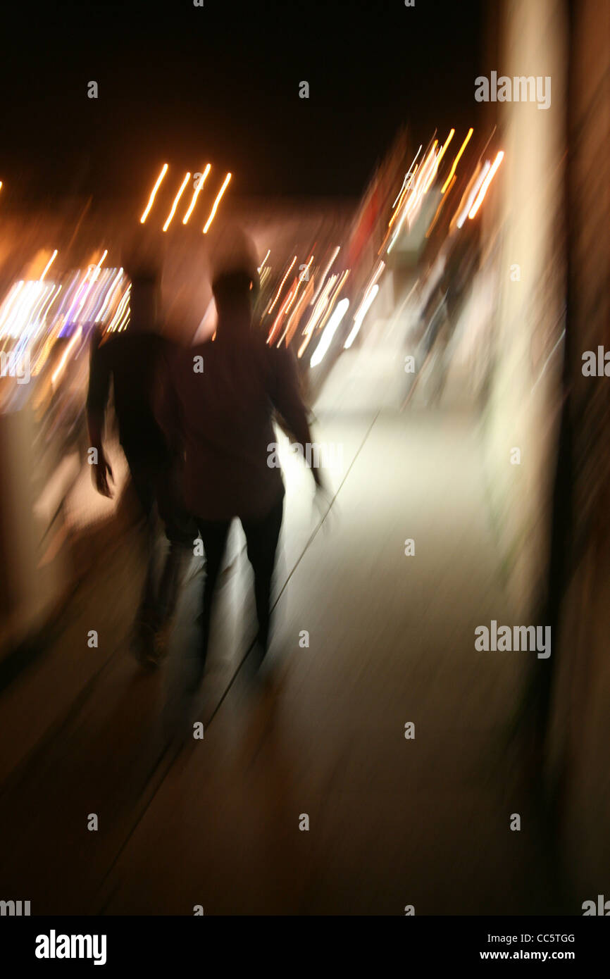 people walking in street at night Stock Photo - Alamy