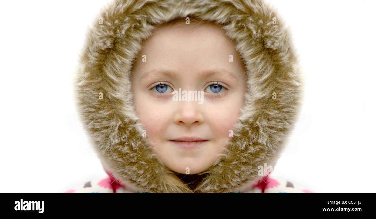 pretty 3 year old girl close up of face framed by faux fur trimmed hood ...