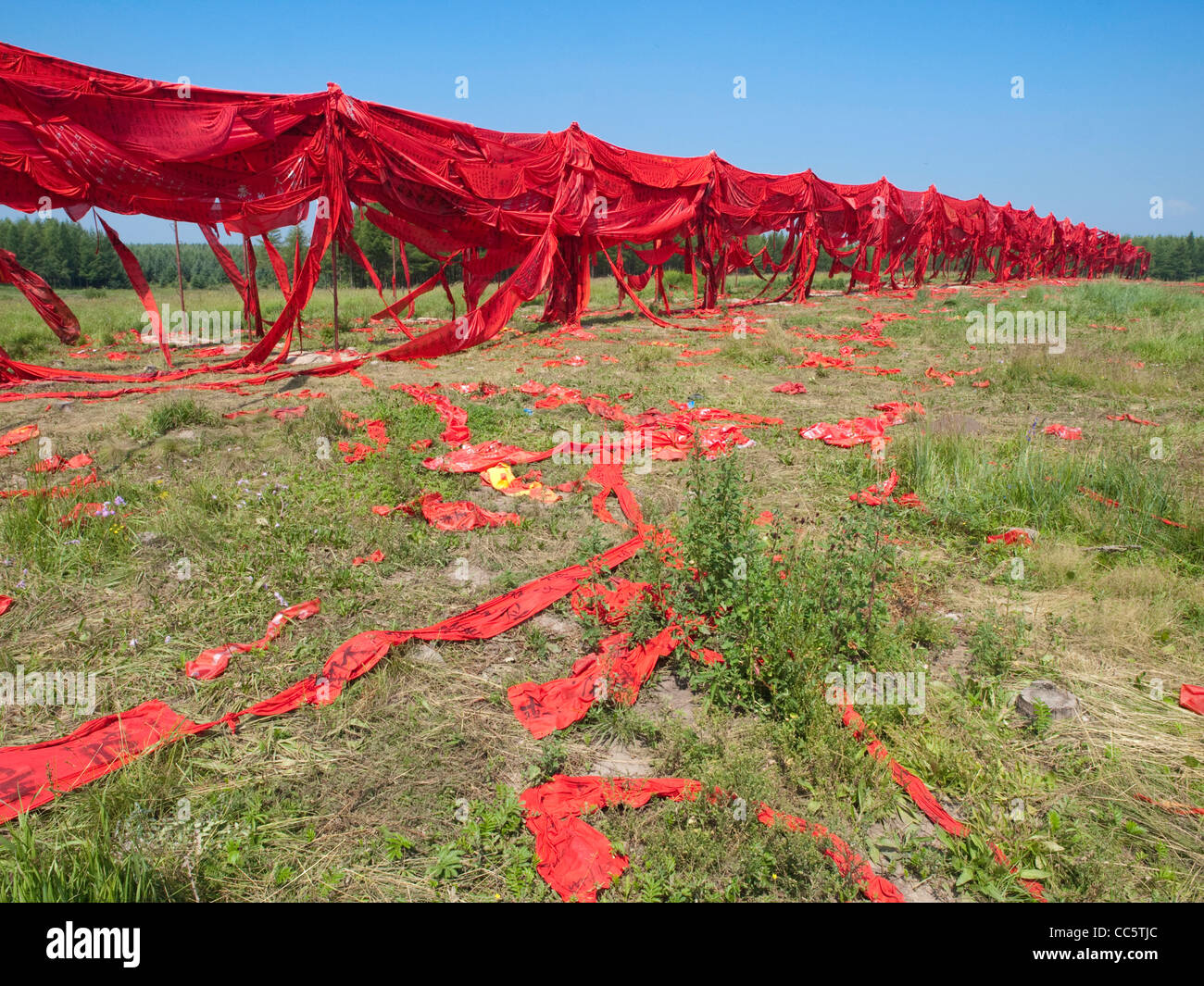 Fence with red prayer flags, Hexigten Global Geopark, Chifeng, Inner ...