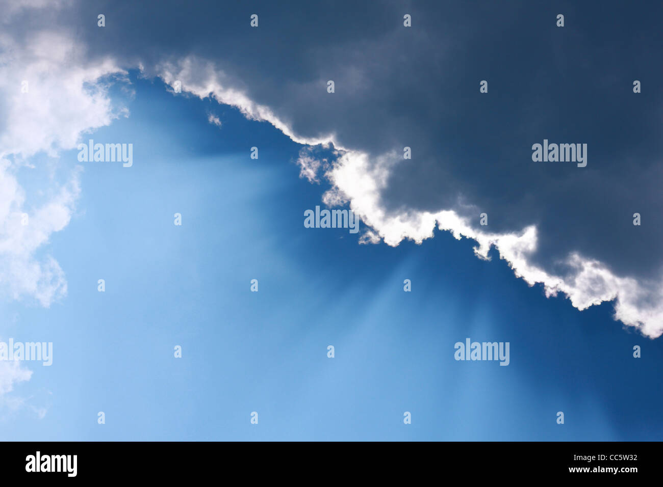 Sunbeam on blue sky Stock Photo - Alamy