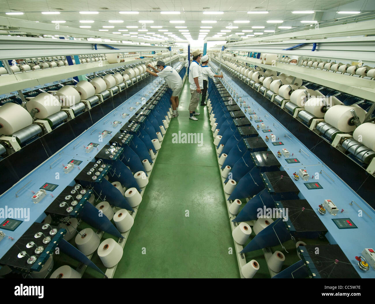 Men working in a textile factory, Laiwu, Shandong , China Stock Photo ...