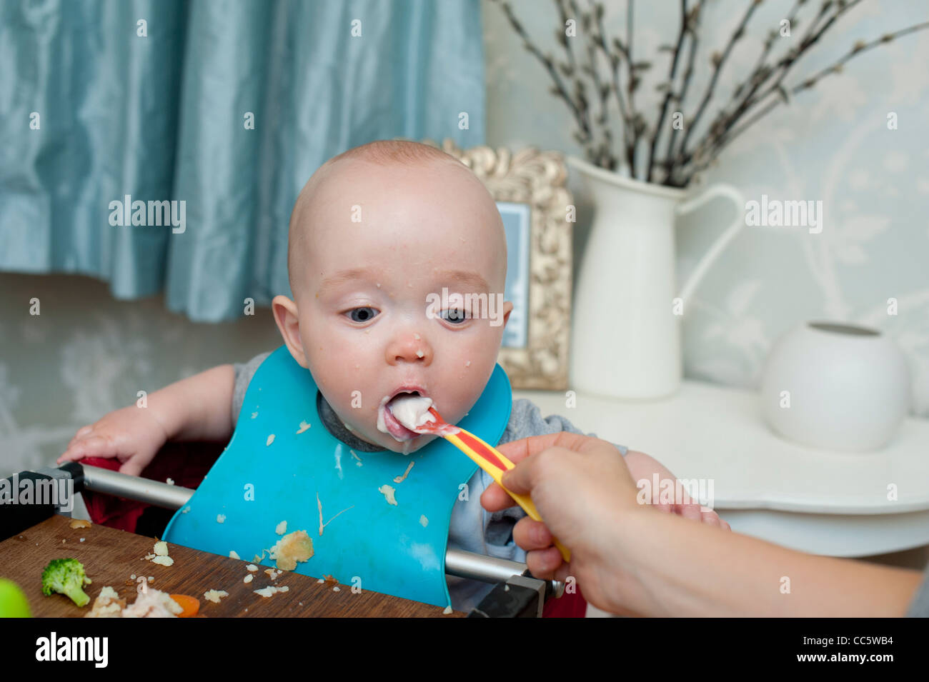 Baby eating himself hi-res stock photography and images - Alamy