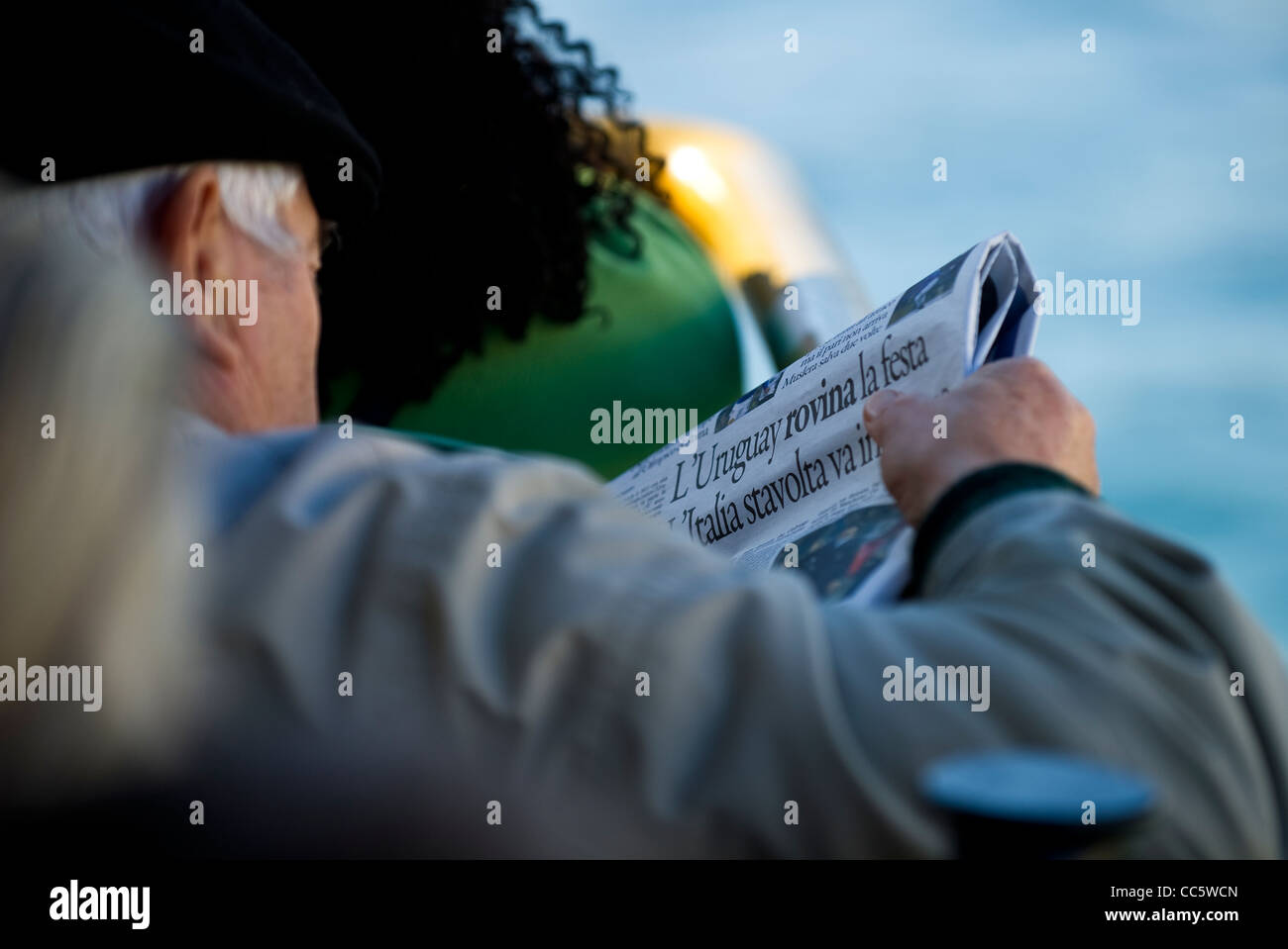 Italian Man Reading a Newspaper on the Vaporetto, Venice Stock Photo ...