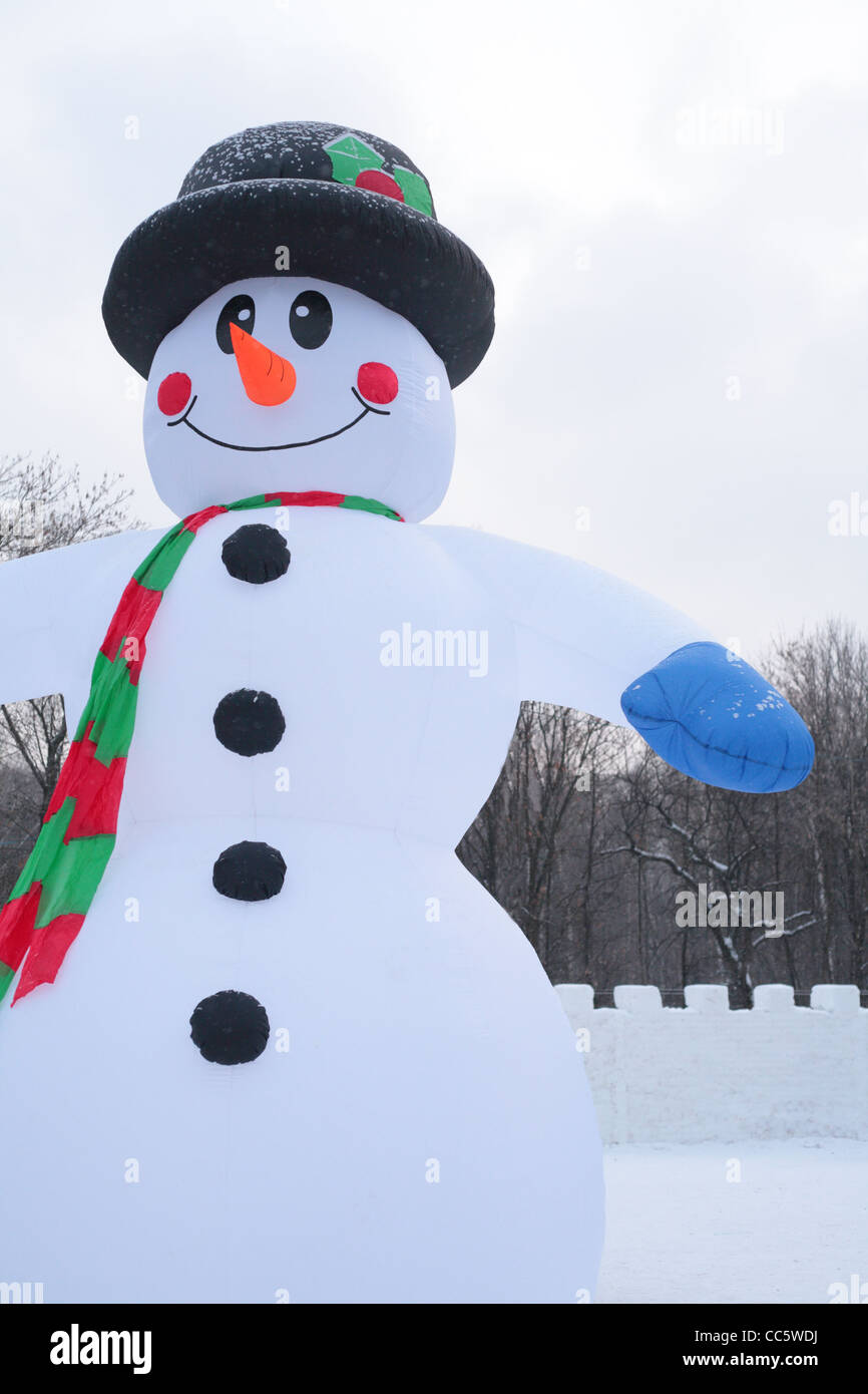 Inflatable snowman in park Stock Photo - Alamy