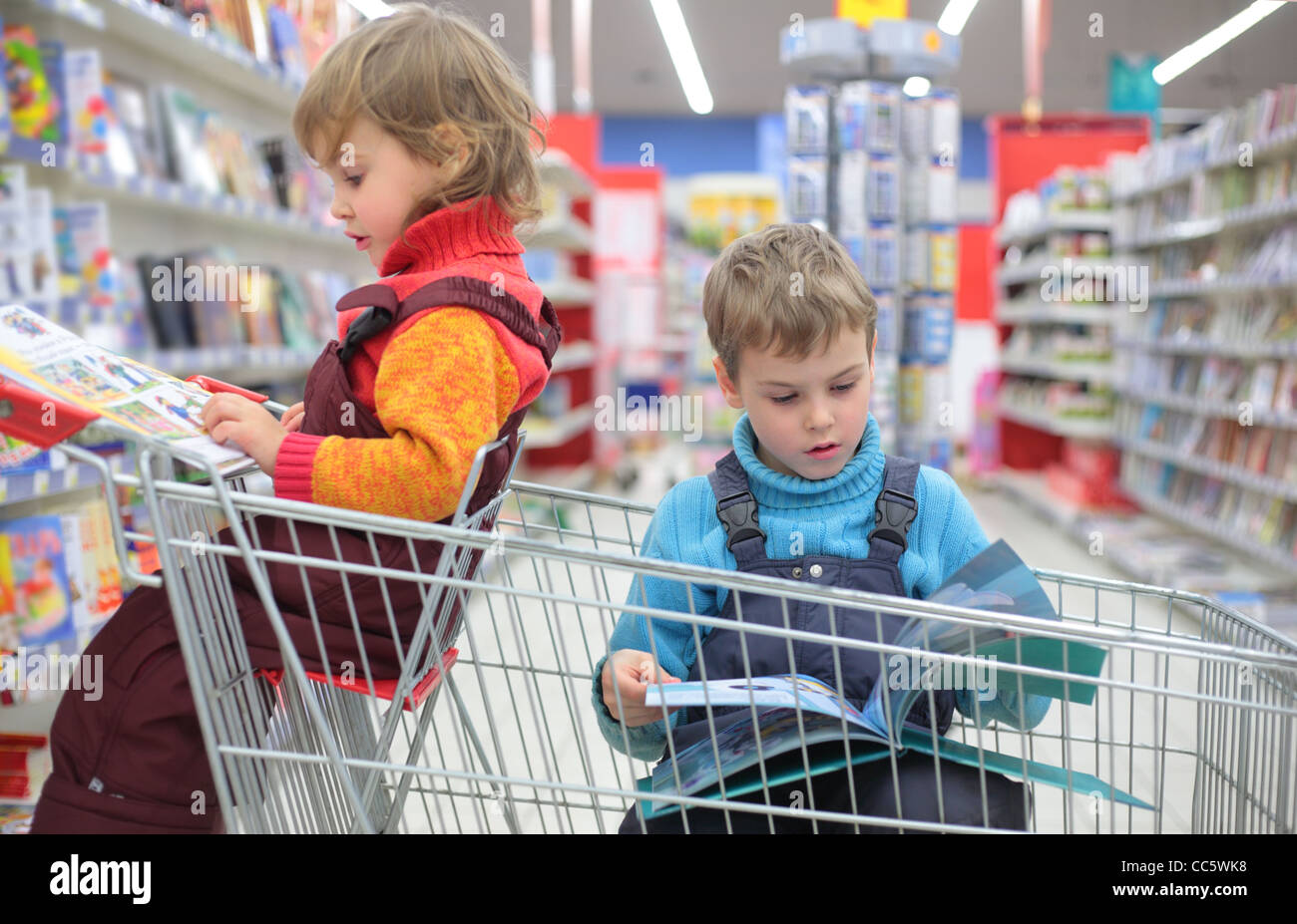 Children in bookshop, focus on boy Stock Photo - Alamy