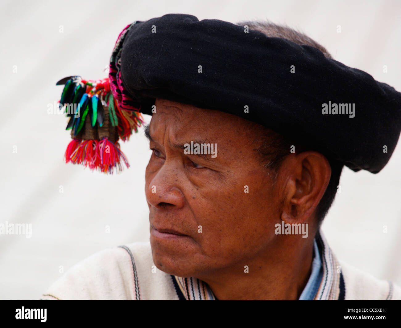 Hani man in traditional costume, Xishuangbanna Nationality Culture Park ...